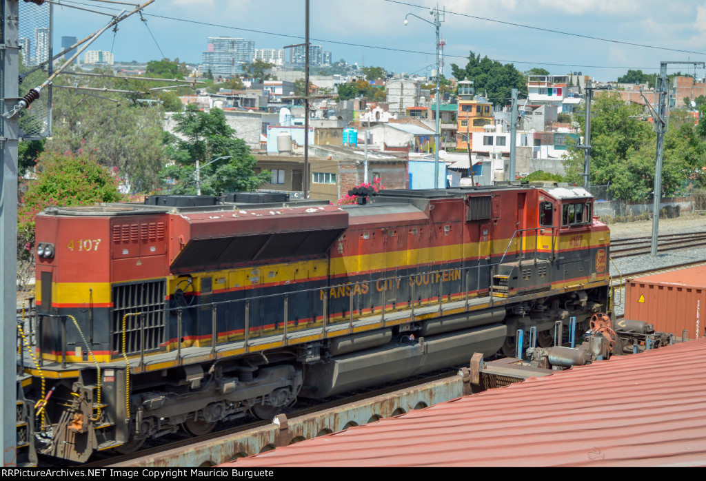KCS SD70ACe leading a train